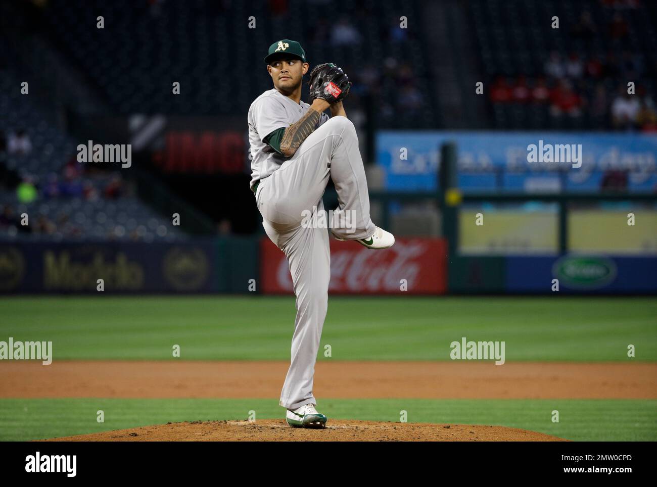 Oakland Athletics starting pitcher Sean Manaea winds up to throw ...