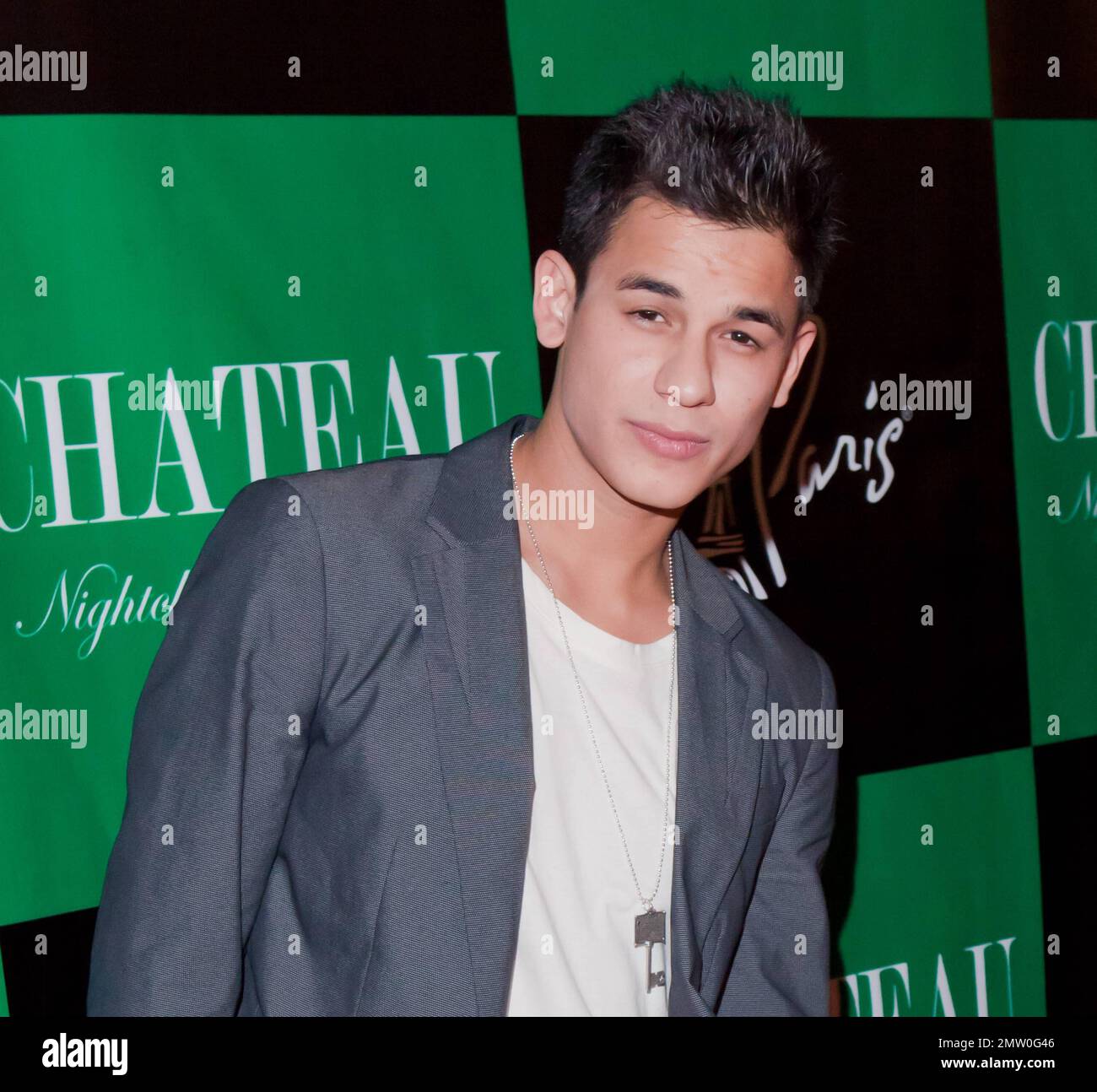 "Twilight" star Kiowa Gordon poses for photographers at Chateau ...