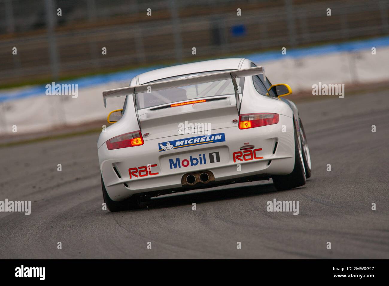 Rear view of a Porsche 911 GT3 Carrera cup car out on track at ...