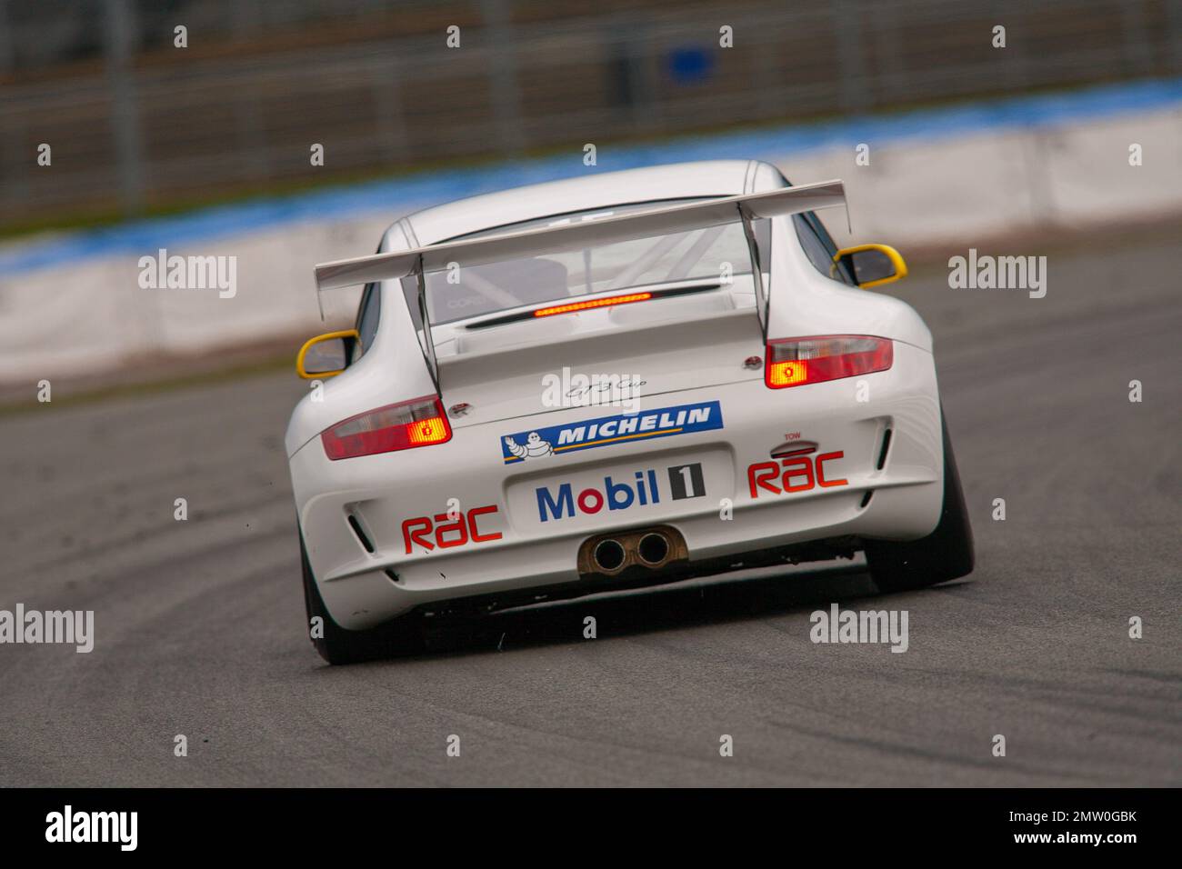 Rear view of a Porsche 911 GT3 Carrera cup car out on track at ...