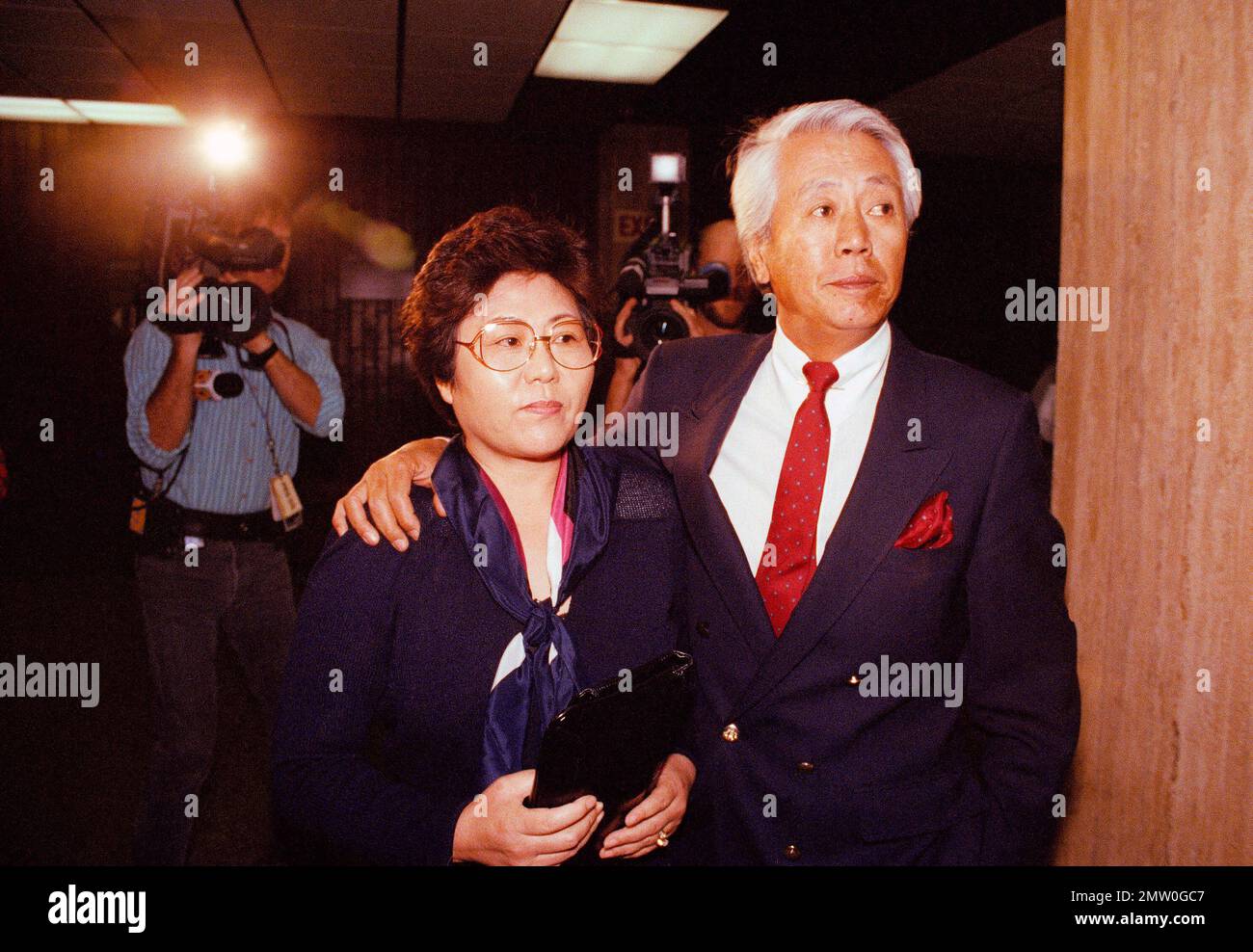 FILE - In this Nov. 24, 1992 file photo, Soon Ja Du, 51, left, leaves ...