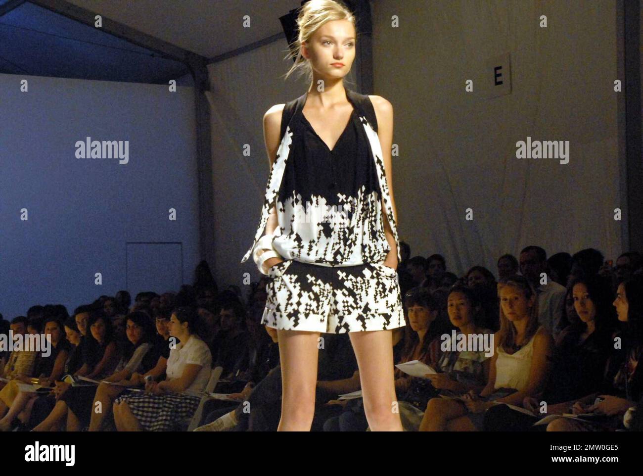 Models walk the runway wearing Twinkle by Wenlan at the fashion show ...