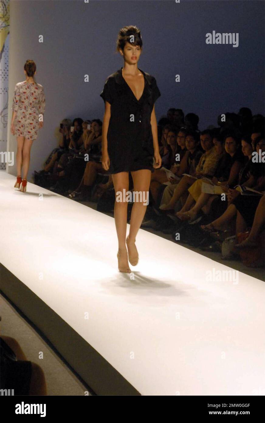 Models walk the runway wearing Twinkle by Wenlan at the fashion show ...