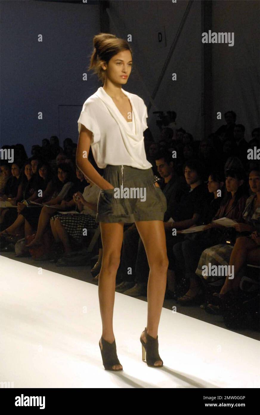 Models walk the runway wearing Twinkle by Wenlan at the fashion show ...