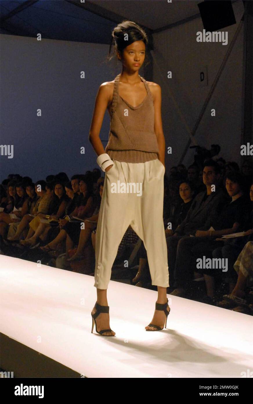 Models walk the runway wearing Twinkle by Wenlan at the fashion show ...