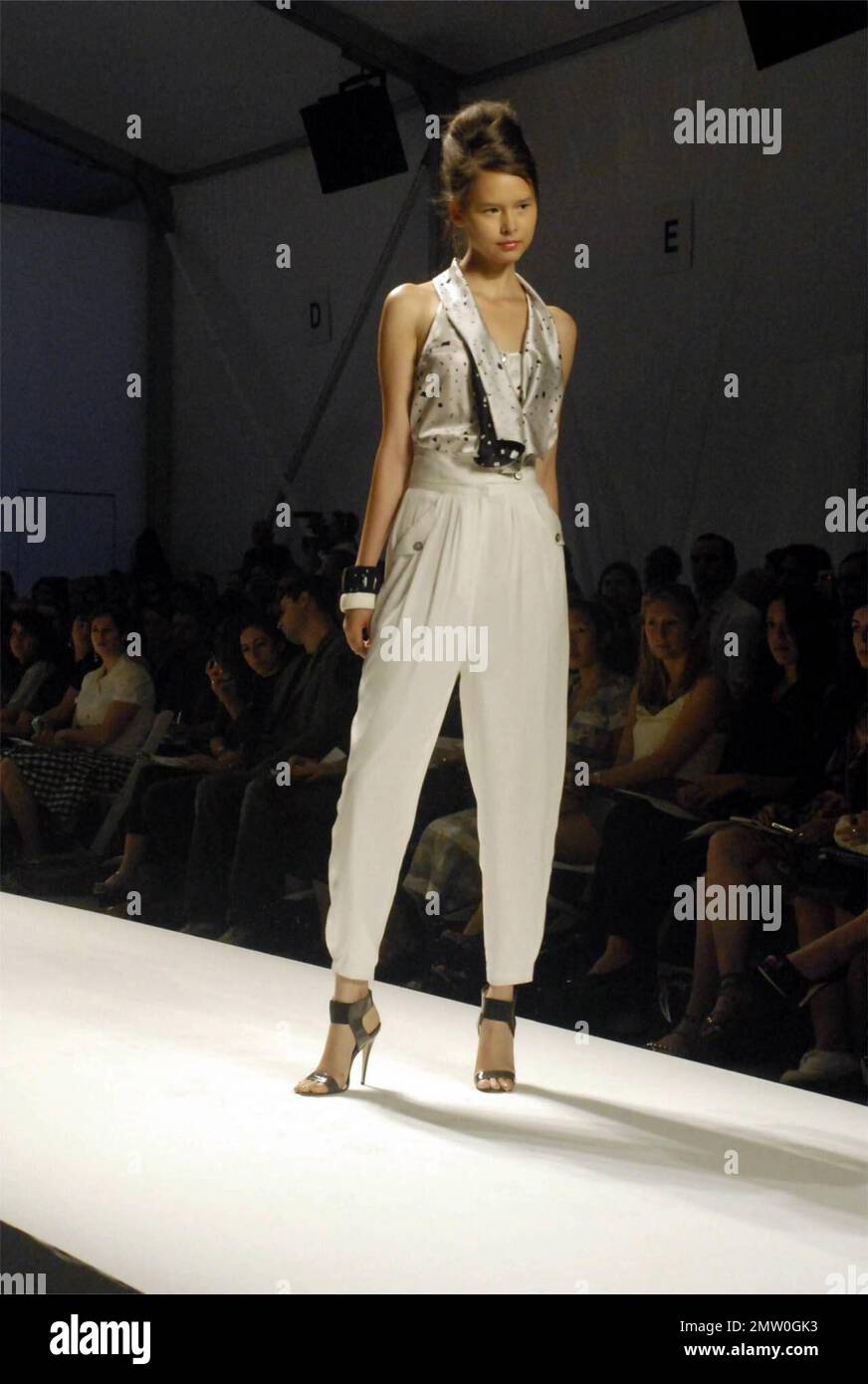 Models walk the runway wearing Twinkle by Wenlan at the fashion show ...