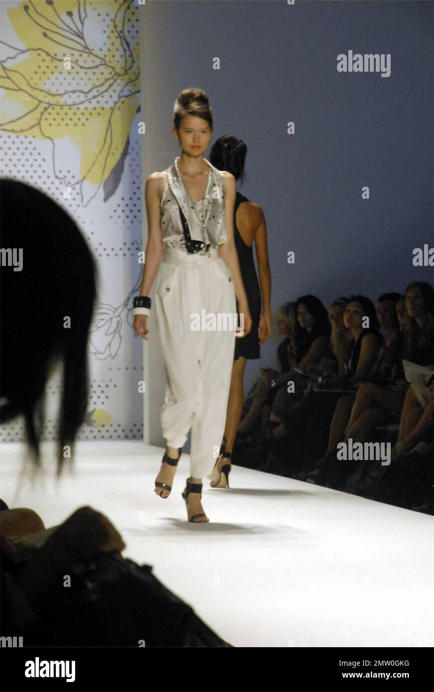 Models walk the runway wearing Twinkle by Wenlan at the fashion show ...