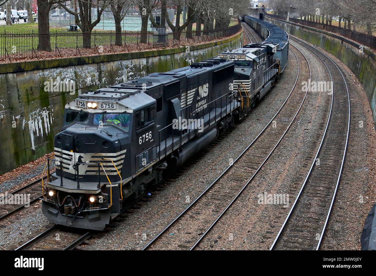 In this Thursday, Jan. 26, 2017, photo, a Norfolk Southern freight train hauling coal makes it ...