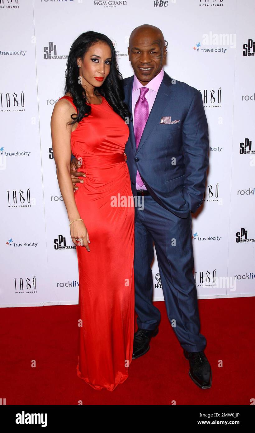 Mike Tyson and wife Lakiha Tyson at the grand opening of Tyson's one ...