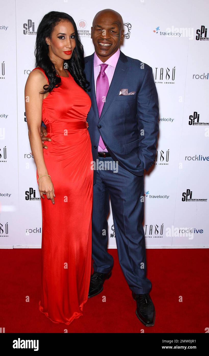 Mike Tyson and wife Lakiha Tyson at the grand opening of Tyson's one ...