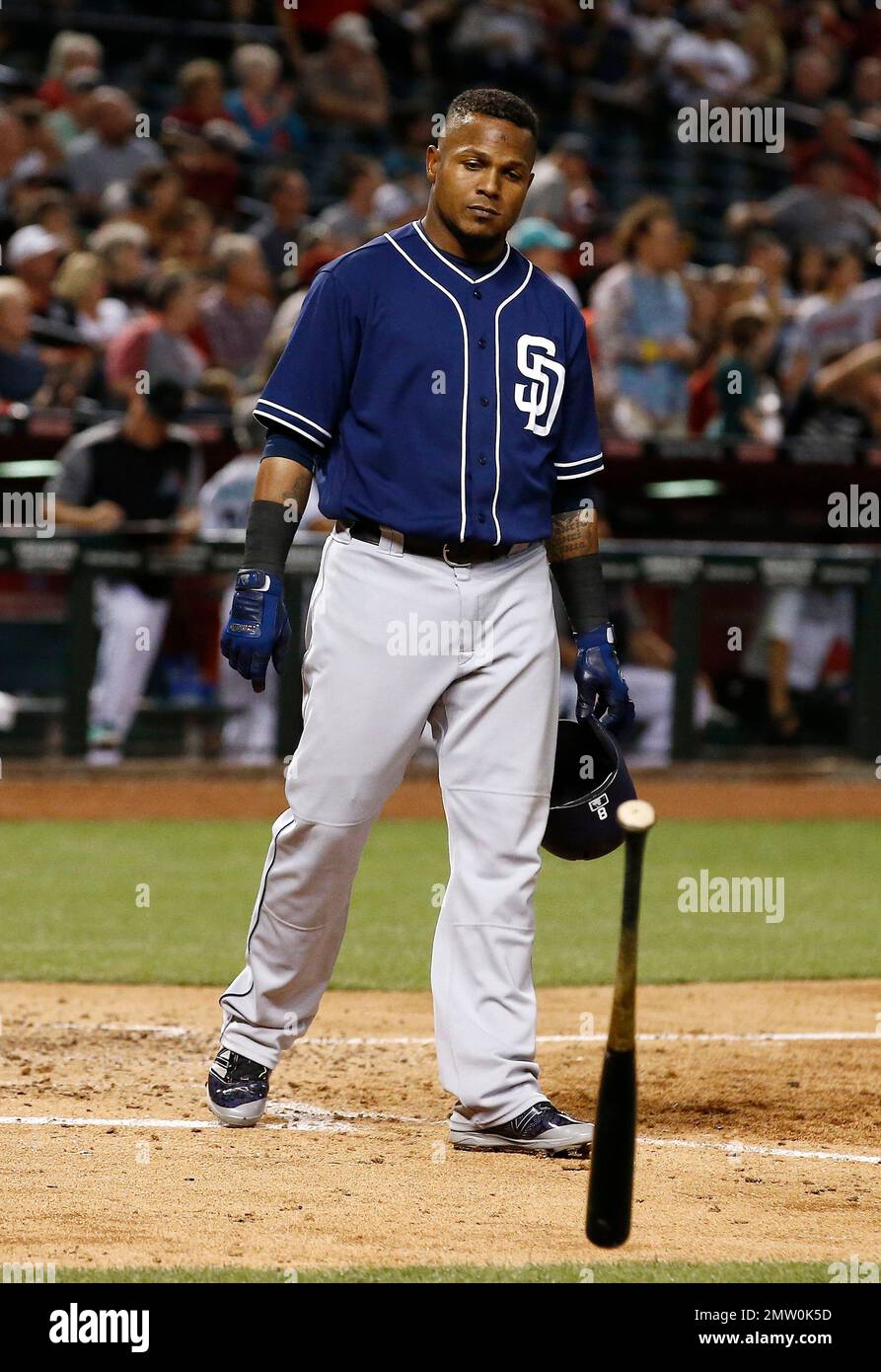 San Diego Padres' Erick Aybar tosses his bat away after striking out ...