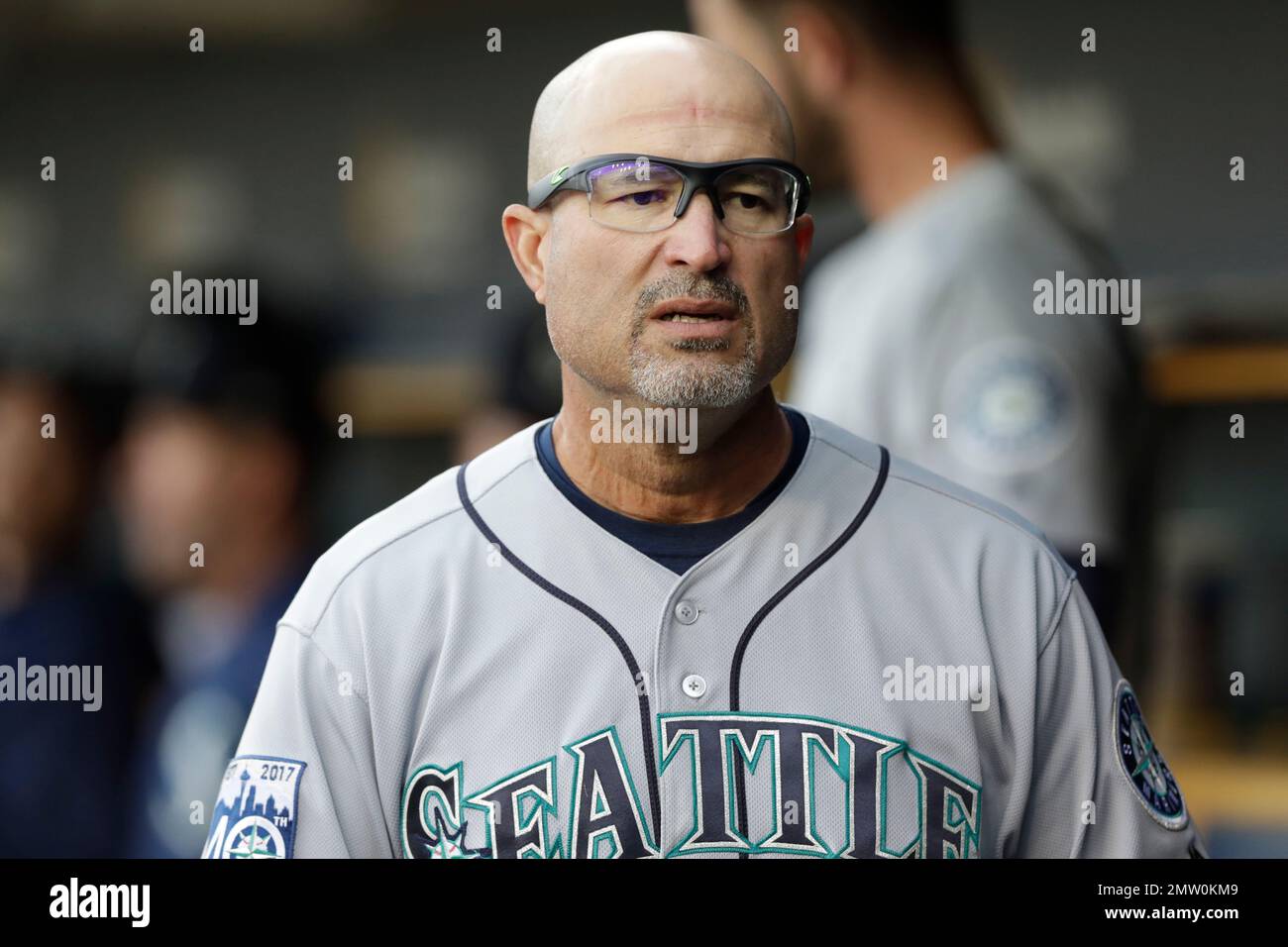 Seattle Mariners third base coach Manny Acta is seen in the dugout ...