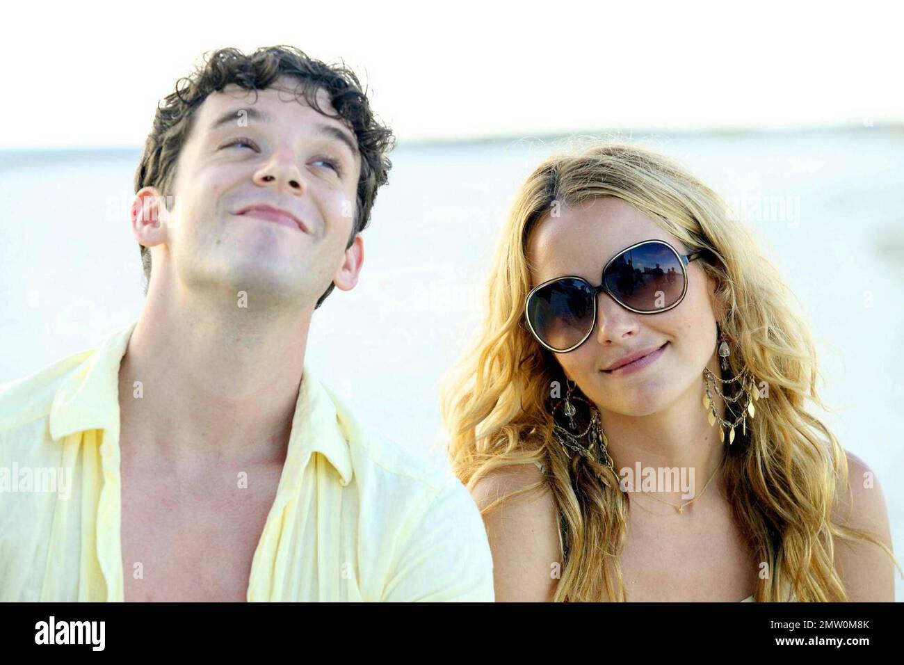 Becki Newton and Michael Urie lounge beachside and frolic on the beach ...