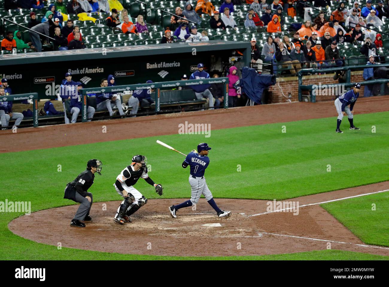Tampa Bay Rays' Tim Beckham singles in front of Baltimore Orioles ...