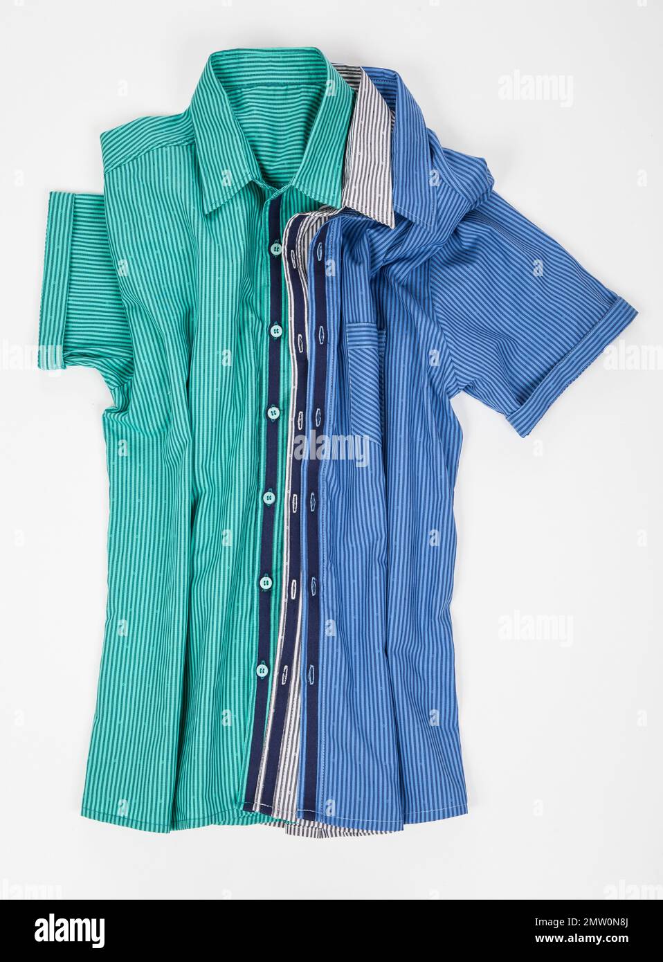 Set Of Three Men Shirts In White Background Stock Photo - Alamy