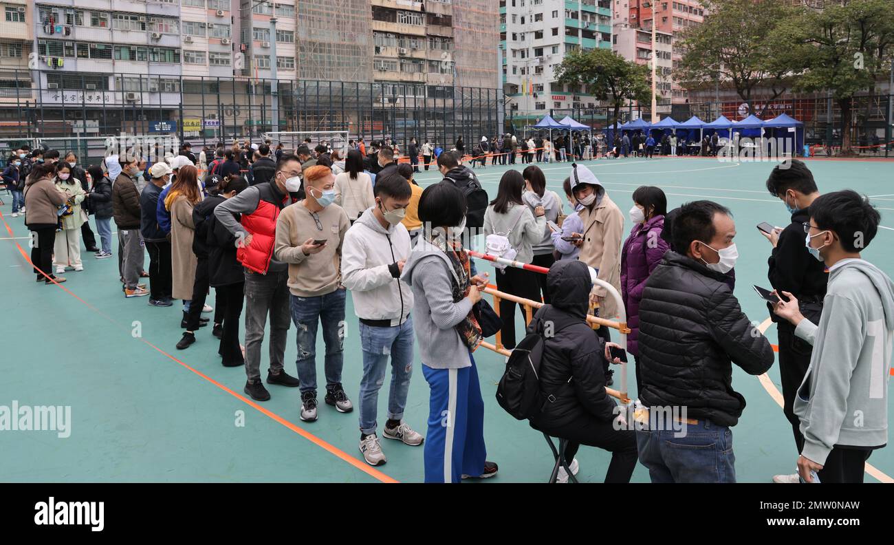 Residents queue up to receive the polymerase chain reaction (PCR) test ...