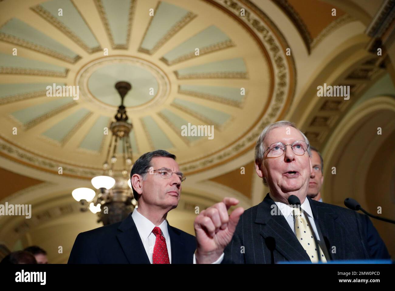 Sen. John Barrasso, R-Wyo. listen at left as Senate Majority Leader ...