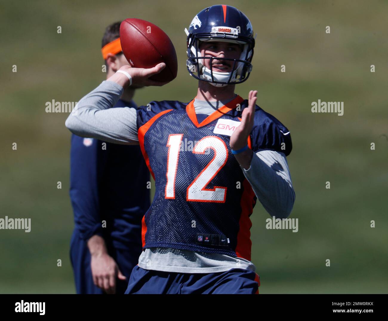 Denver Broncos quarterback Paxton Lynch takes part in drills during a ...