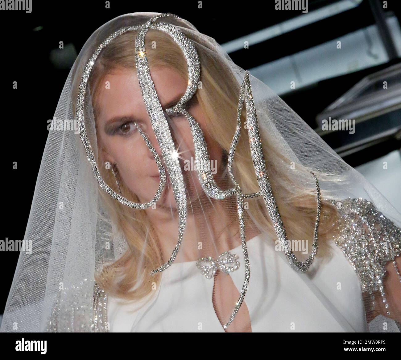 In this April 18, 2017 photo, a model wears bridal fashion from the ...