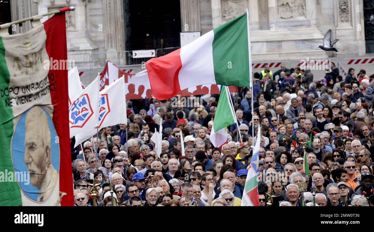 People attend a demonstration to mark Italy's Liberation day, in Milan ...