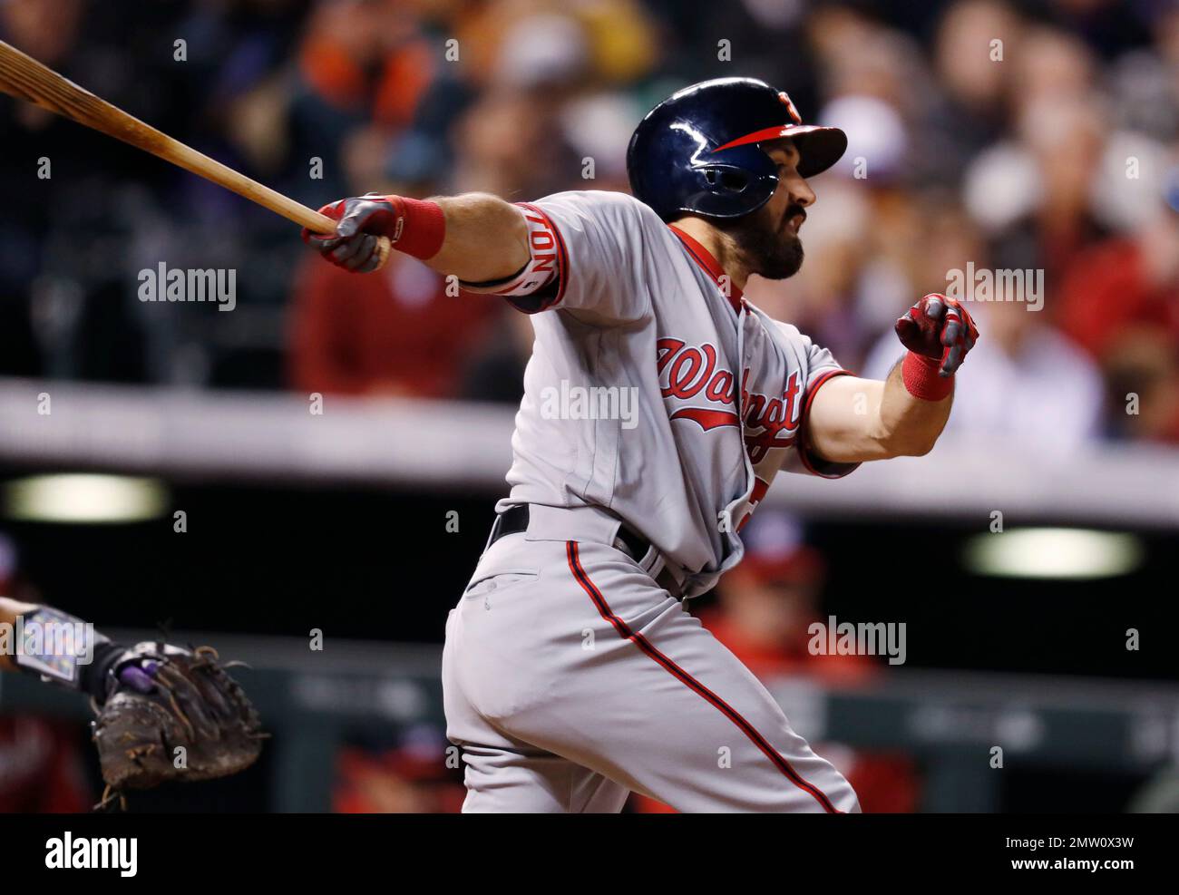 Washington Nationals' Adam Eaton follows the flight of his RBI-triple ...
