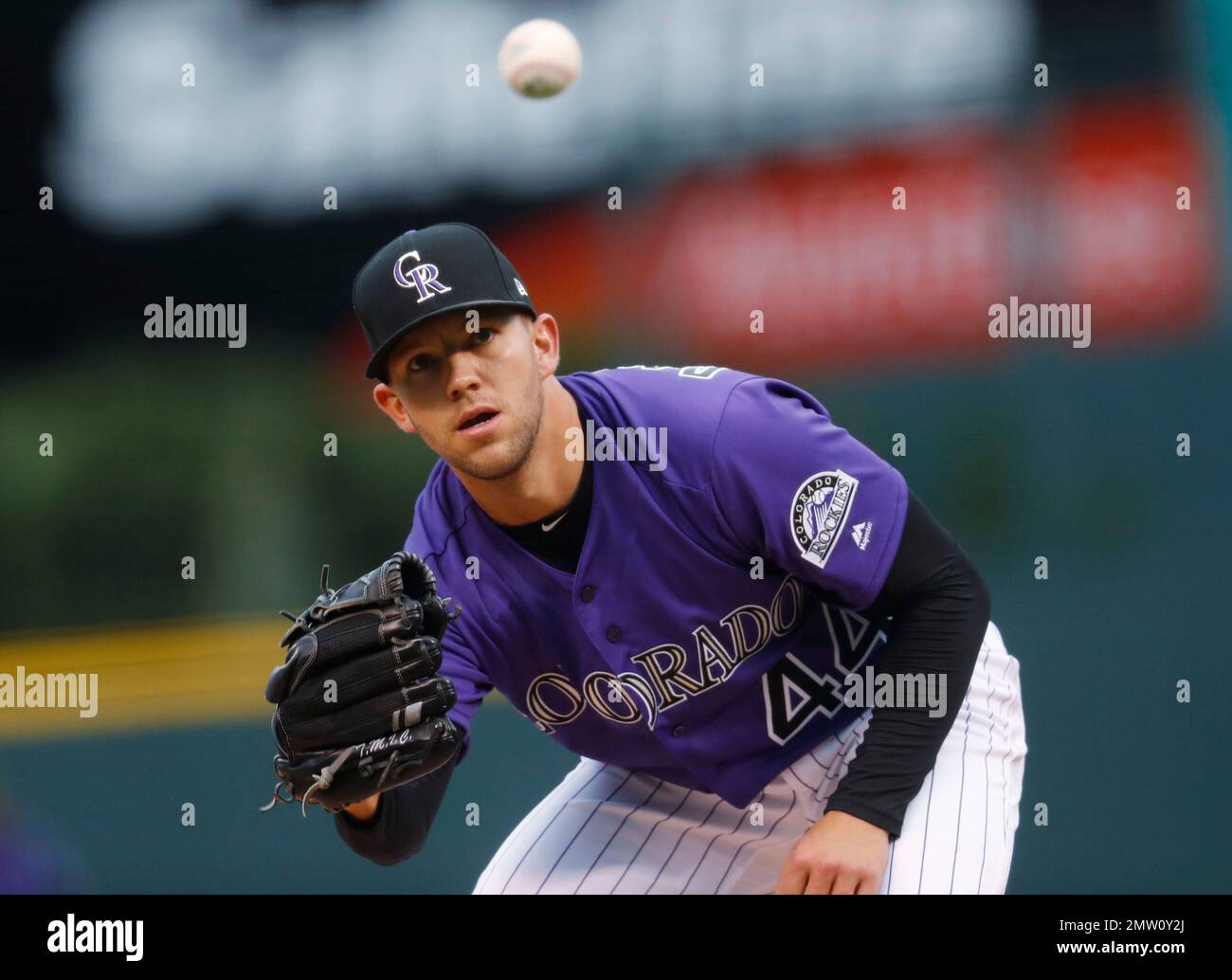 Colorado Rockies starting pitcher Tyler Anderson fields a ball off the ...