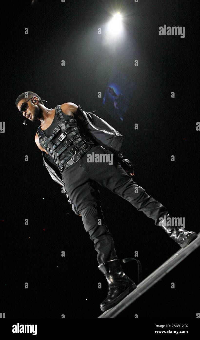 With sweat pouring from his face and clad in a buckle-detailed vest ...