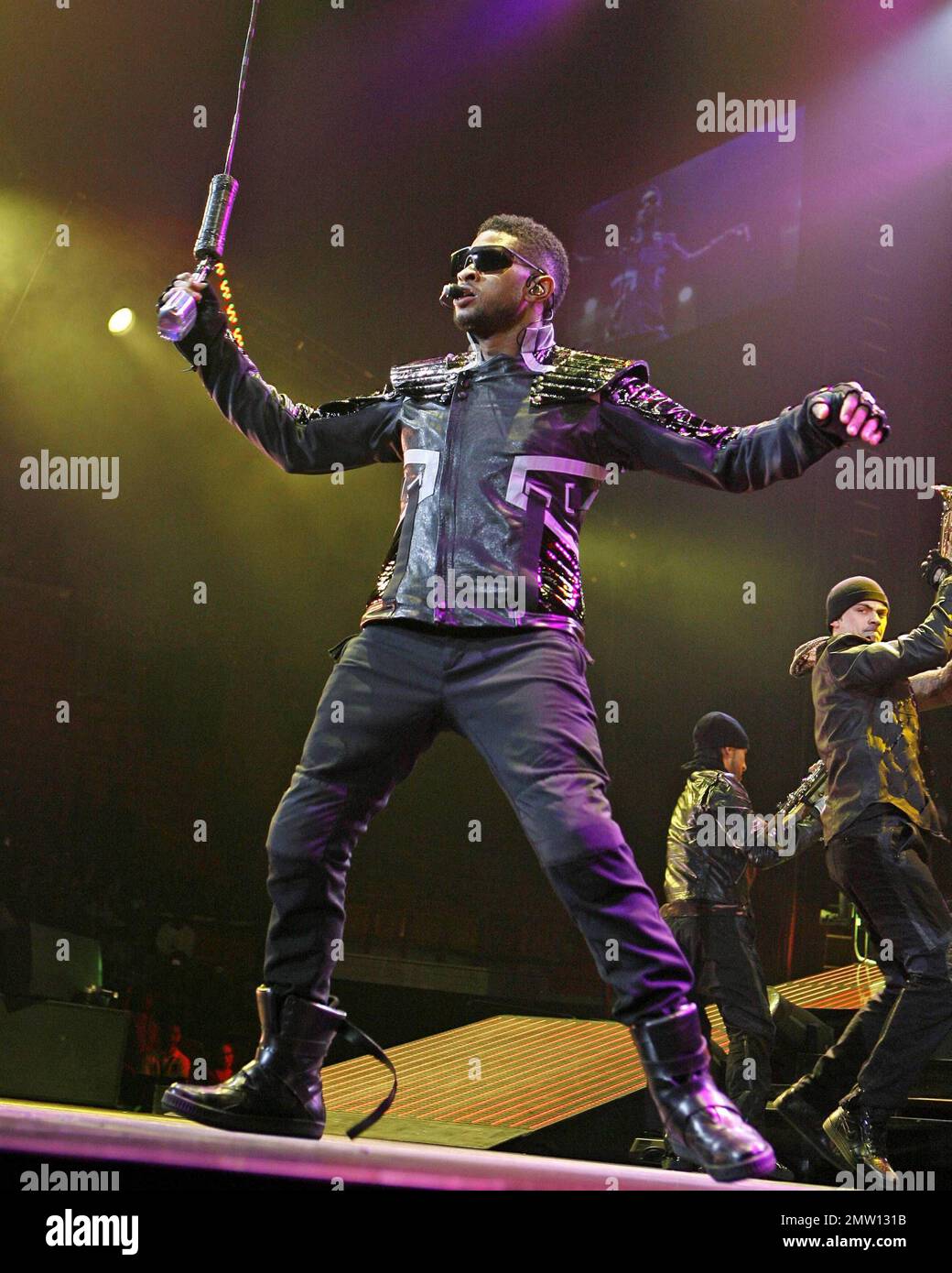 With sweat pouring from his face and clad in a buckle-detailed vest ...