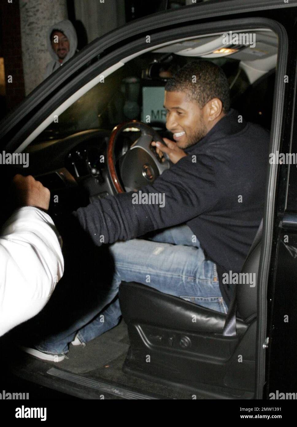 Usher and his wife Tameka Foster are all smiles as they leave the ...