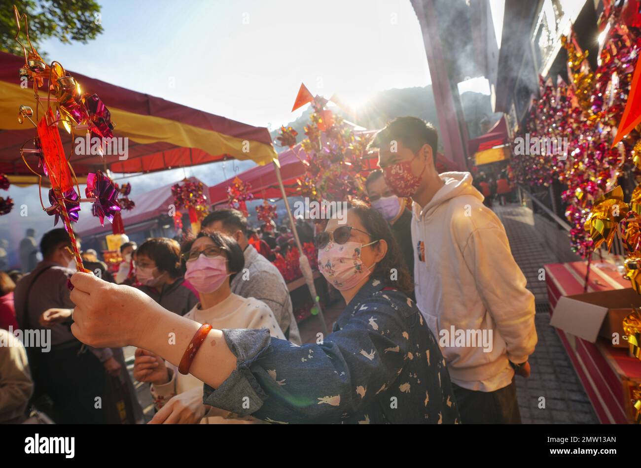 Devotees pray at Che Kung Temple on the second day of the Lunar New ...