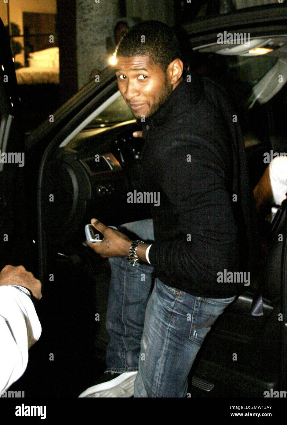Usher and his wife Tameka Foster are all smiles as they leave the ...