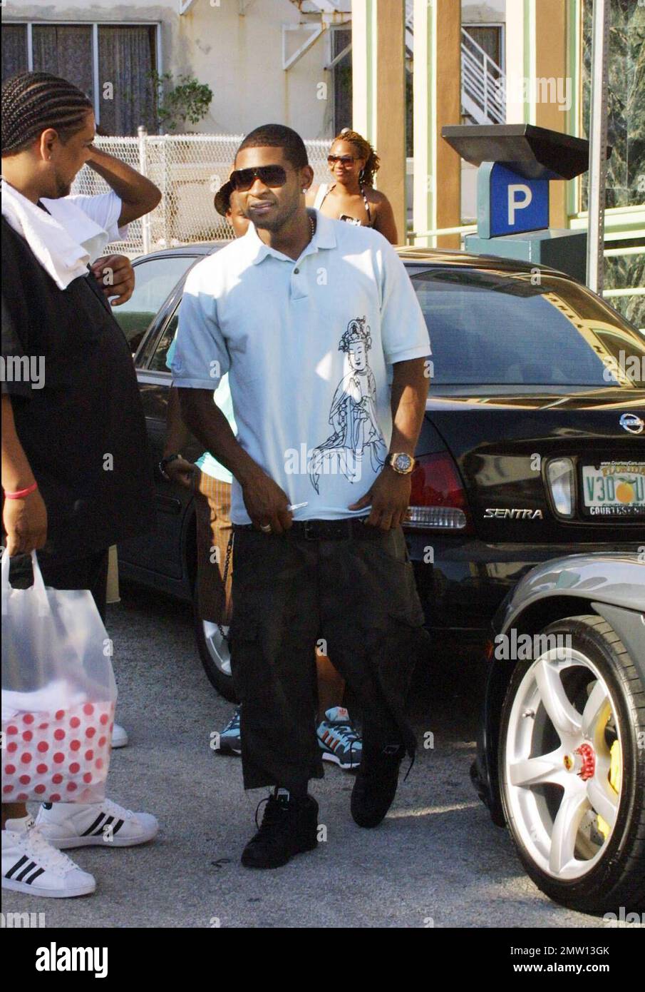Exclusive!! Rap star Usher and younger brother James hit Miami Beach ...