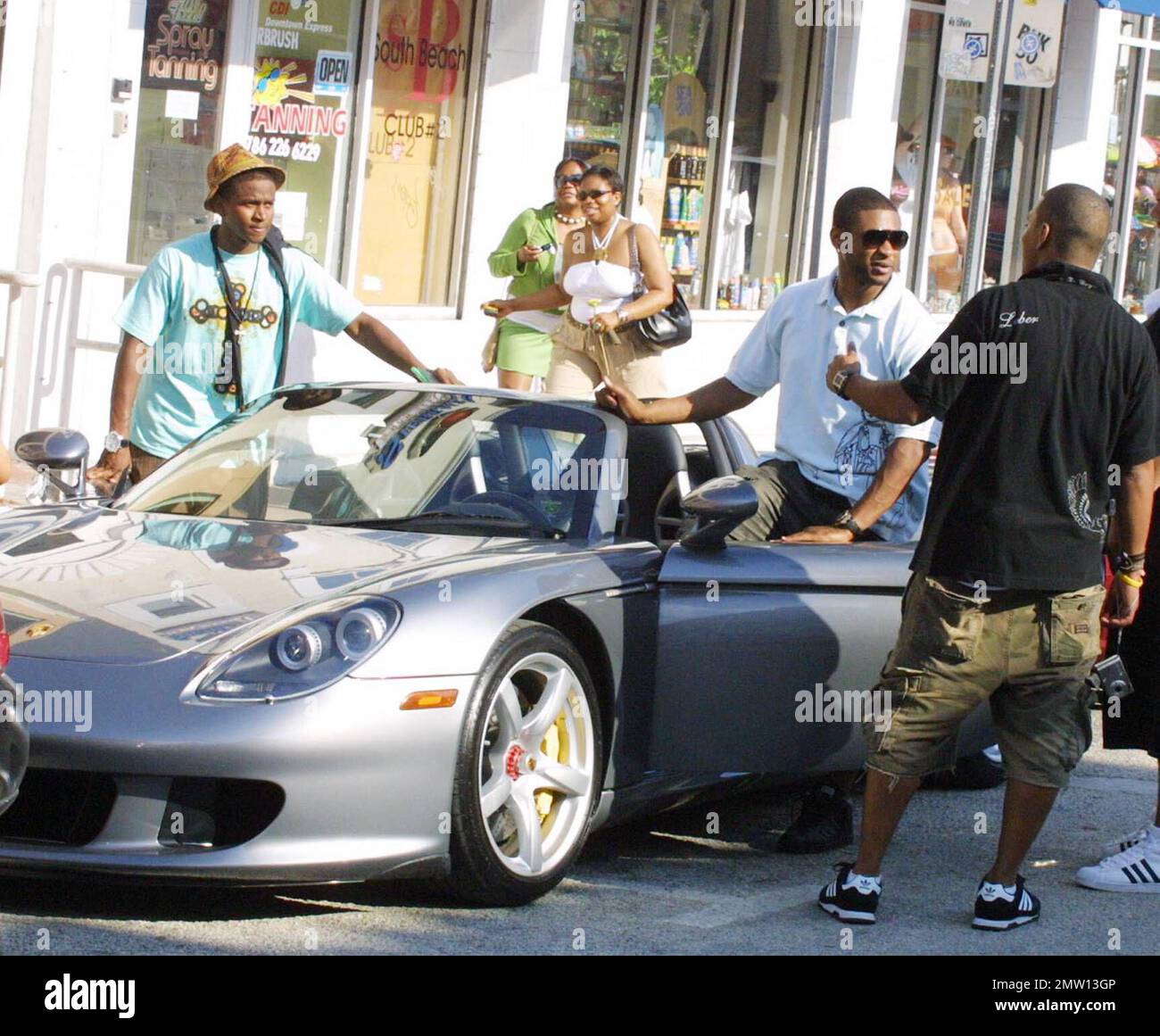 Exclusive!! Rap star Usher and younger brother James hit Miami Beach ...