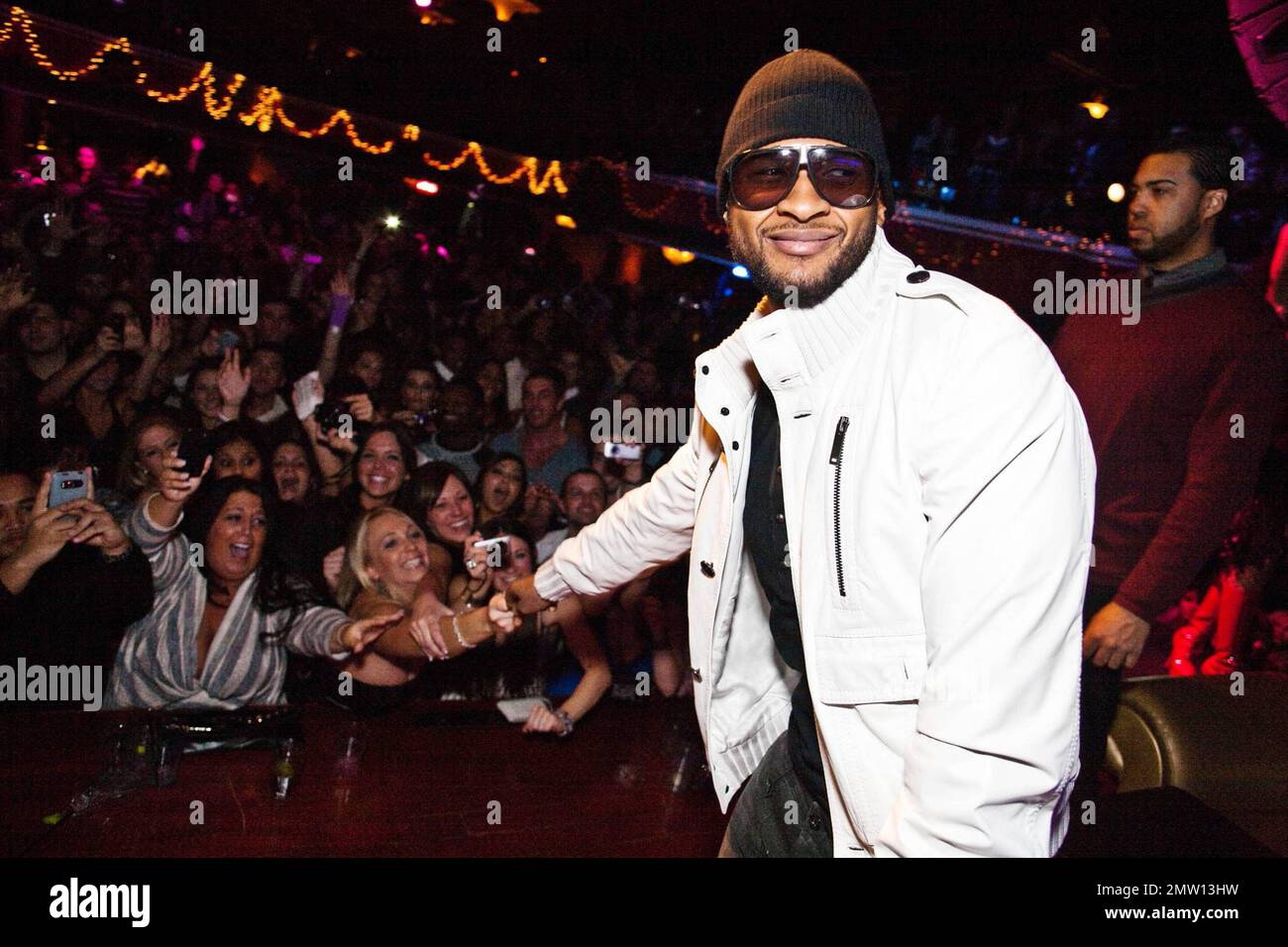R&B musician Usher (aka Usher Raymond IV) appeared to enjoy chatting ...
