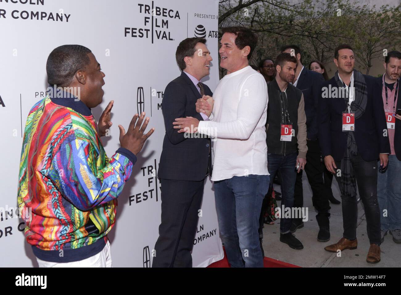 Actors Tracy Morgan, left, Ed Helms and Businessman Mark Cuban attend a ...