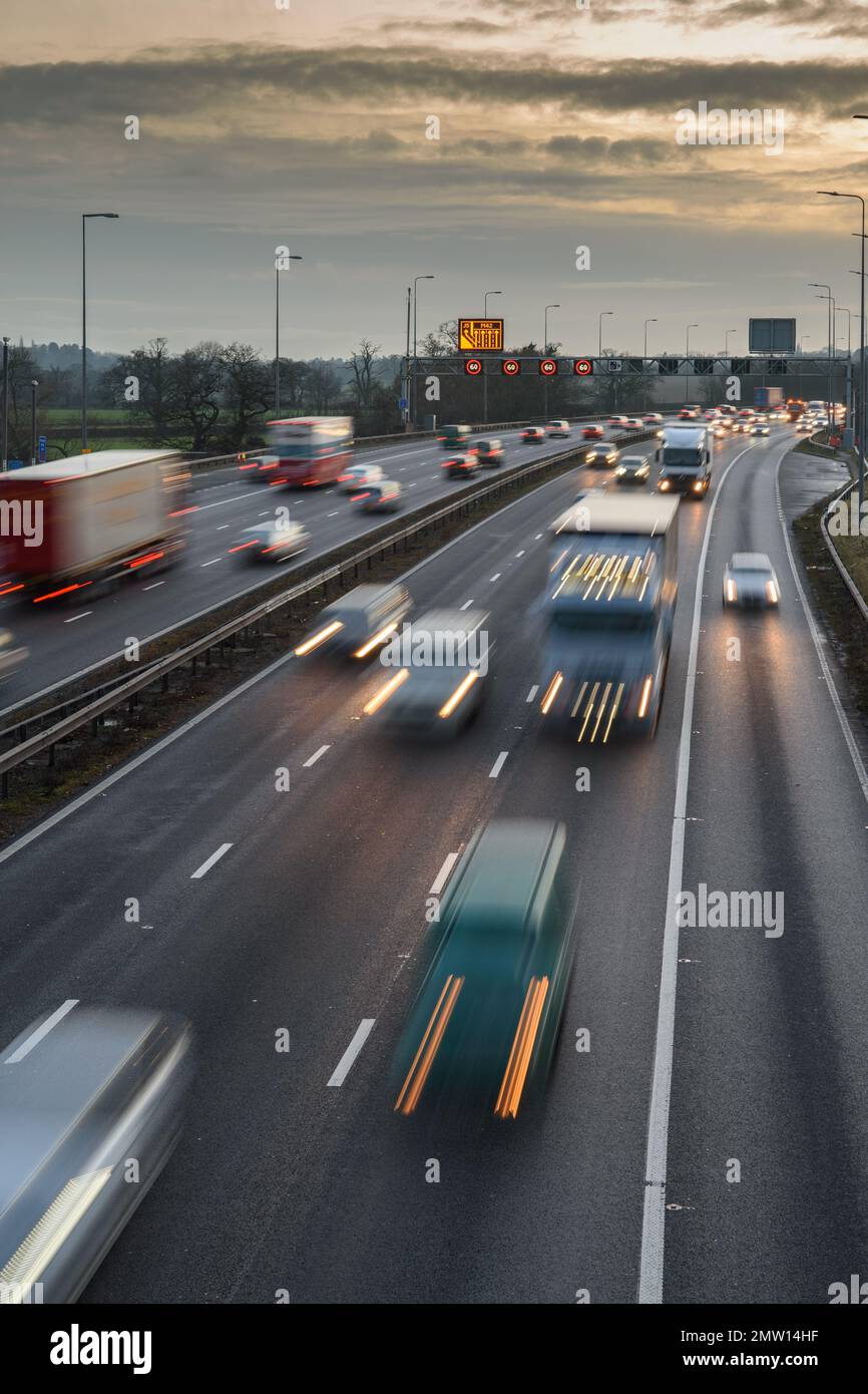 Long exposure photography of fast moving traffic speeding along the M42 ...