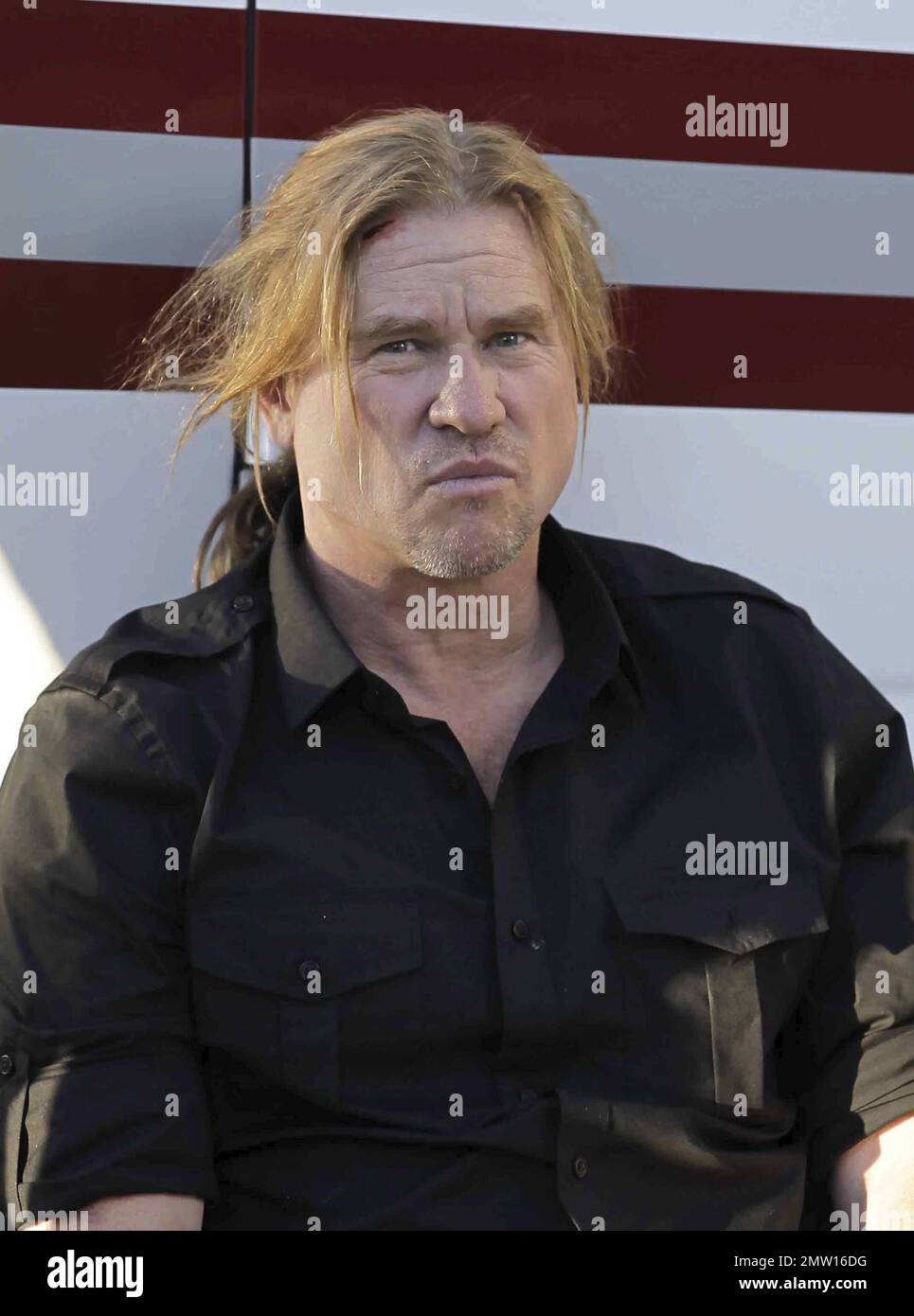 EXCLUSIVE!! Actor Val Kilmer makes a face while relaxing on the set of ...