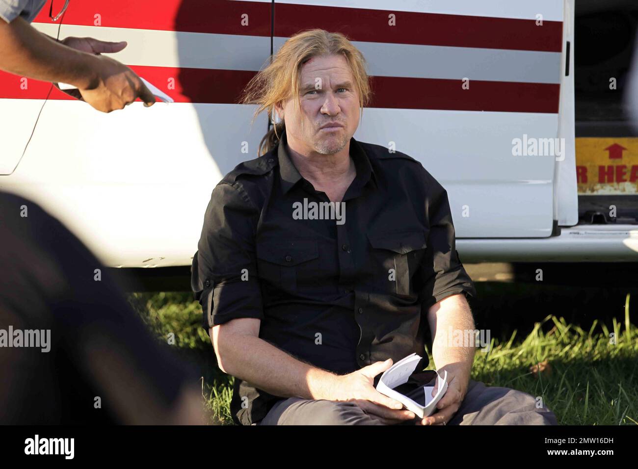 EXCLUSIVE!! Actor Val Kilmer makes a face while relaxing on the set of ...