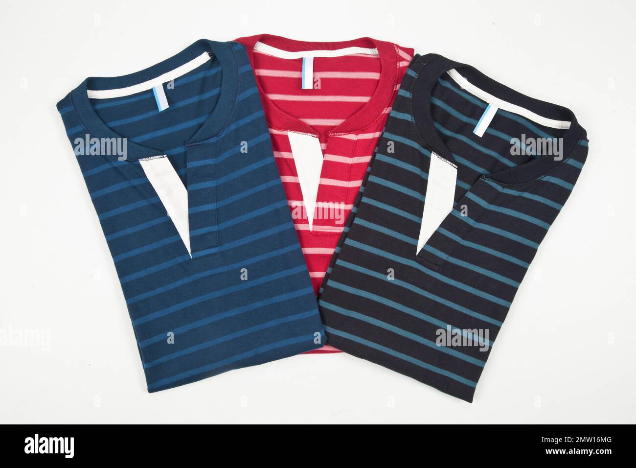 Set Of Three Striped Shirts For Men On White Background Stock Photo - Alamy