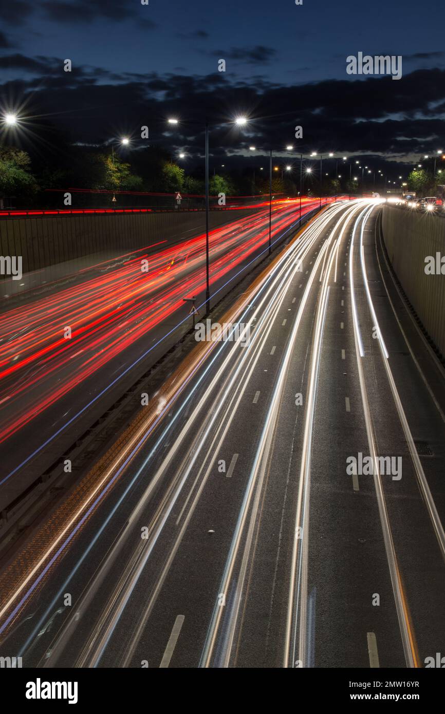 Light trails from fast moving traffic on the A40 at Perivale in London ...