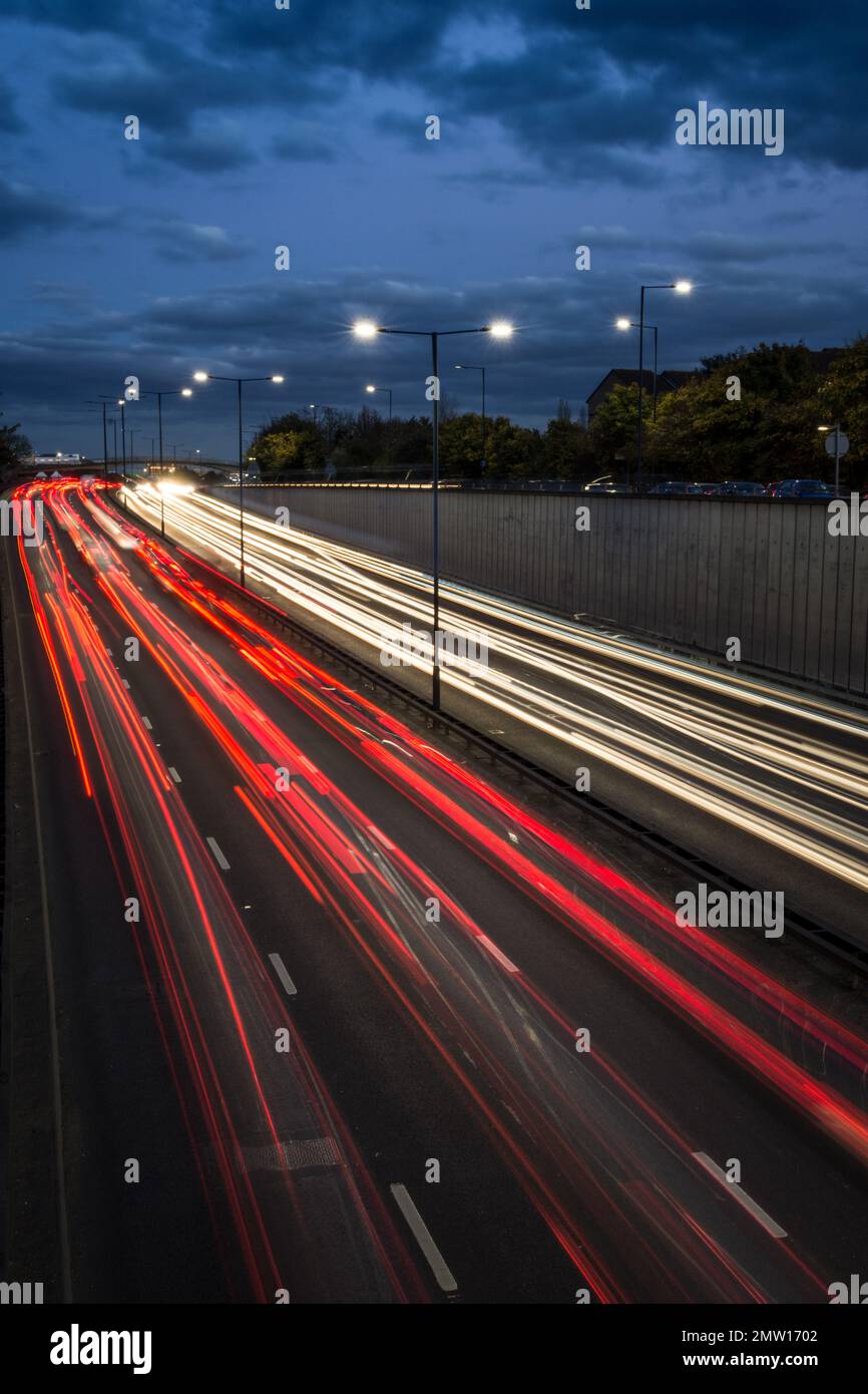 Light trails from fast moving traffic on the A40 at Perivale in London ...