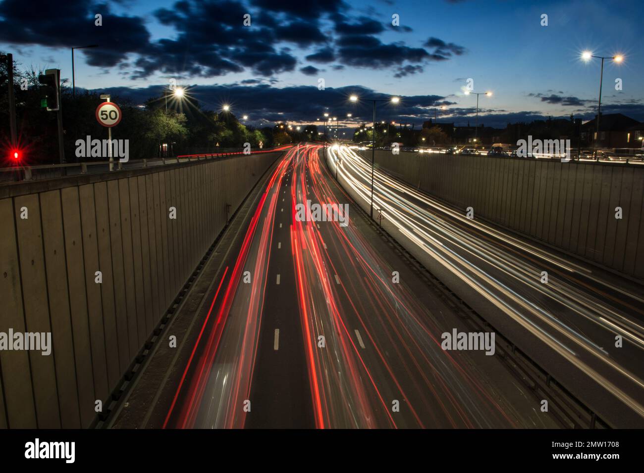Light trails from fast moving traffic on the A40 at Perivale in London ...