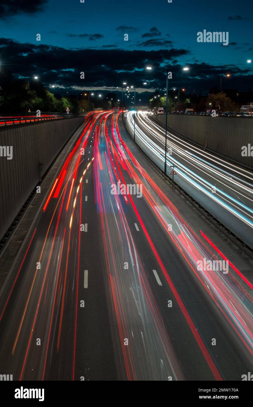 Light trails from fast moving traffic on the A40 at Perivale in London ...