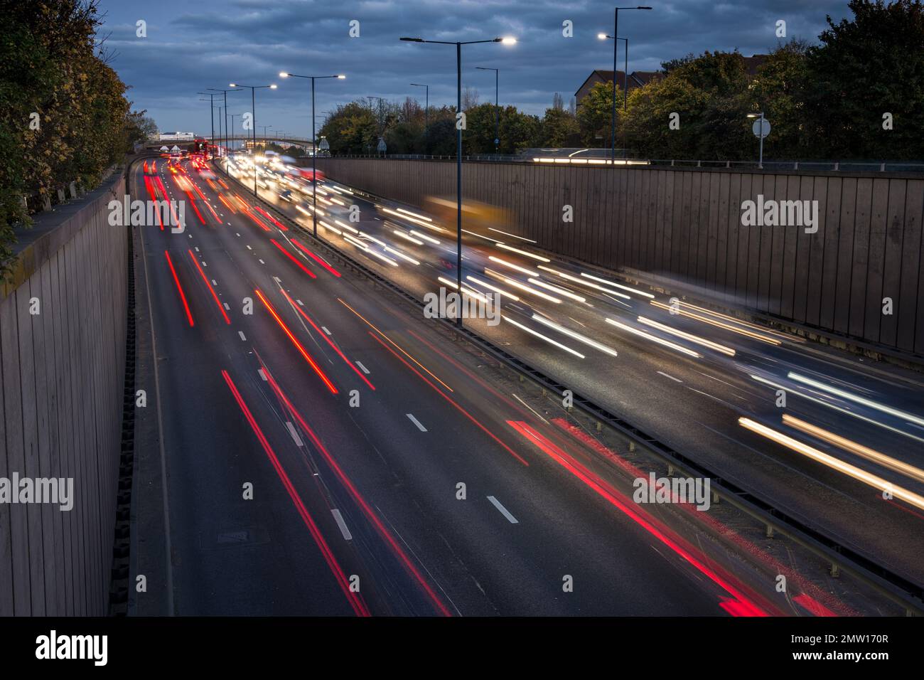 Light trails from fast moving traffic on the A40 at Perivale in London ...