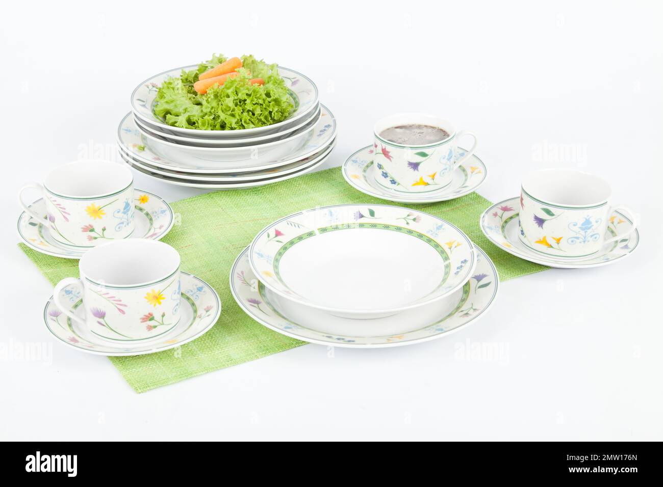 White Modern Dishes With Figures Flowers Shapes Stock Photo - Alamy