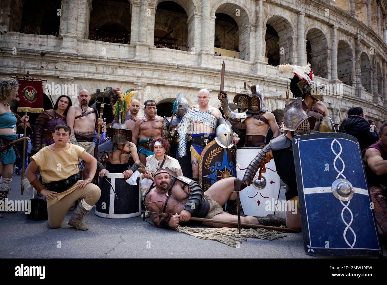 Ancient Roman enthusiasts pose for photos as they parade in the areas ...
