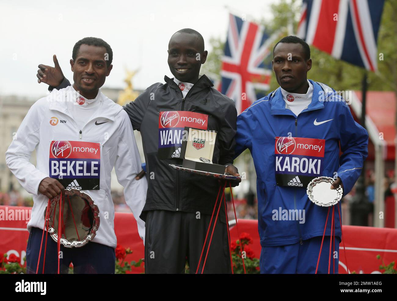 Race winner Kenya's Daniel Wanjiru, center, second place Ethiopia's ...
