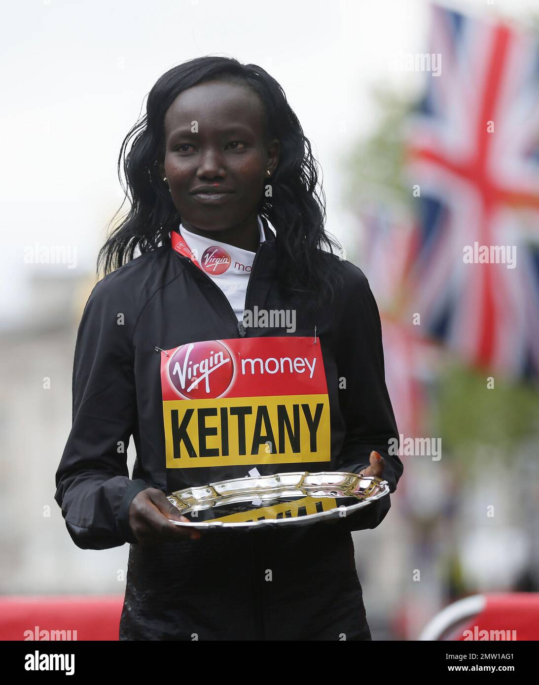 Race winner Kenya's Mary Keitany poses with her trophy plate at the ...