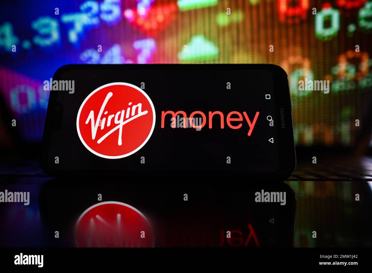 In this photo illustration, a Virgin Money logo is displayed on a ...