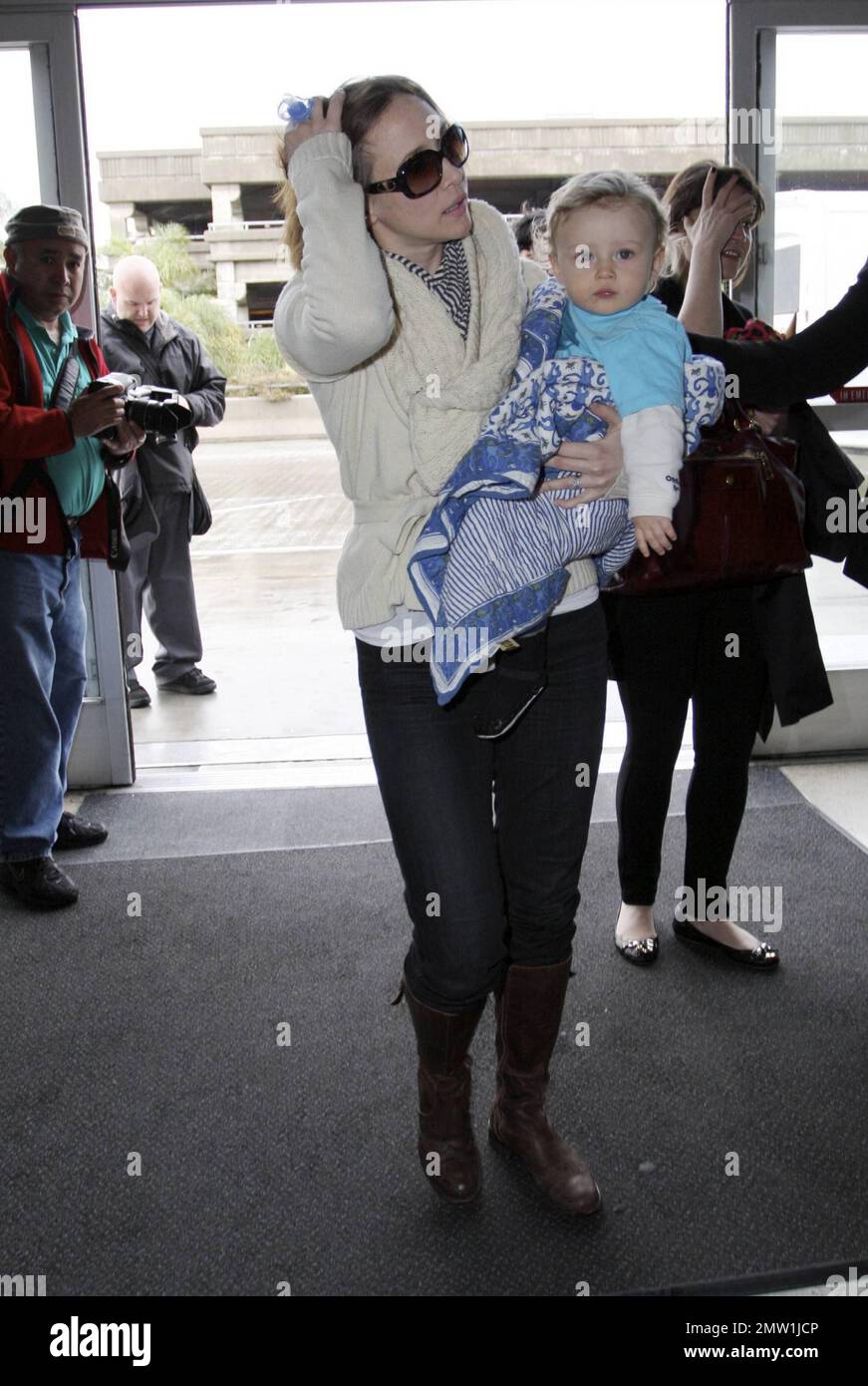 "Up in the Air" star Vera Farmiga carries her son Flynn as she arrives ...